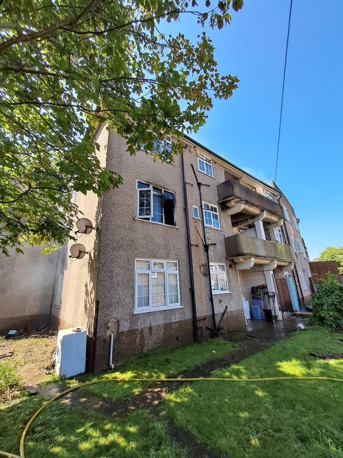 An investigation has launched after a block of flats caught fire in ...